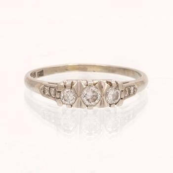 An 18K white gold ring with single cut and round brilliant cut diamonds ...