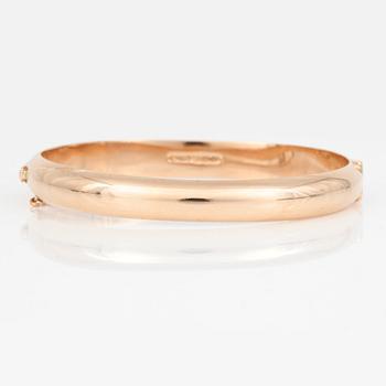 ARMRING, 14K guld. Finland 1965. Total vikt 14,2 g. - Bukowskis