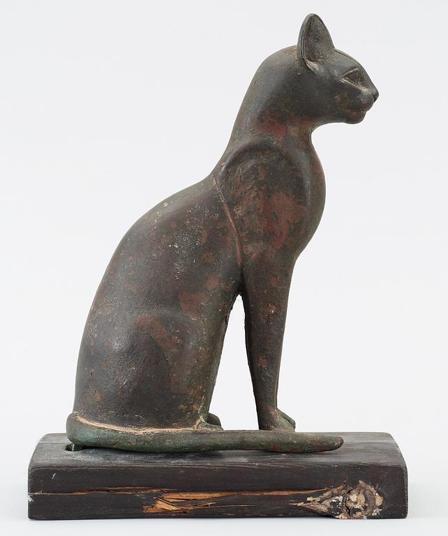 A bronze cat statuette, Egypt, possibly 22-30 Dynasty, 945-332 BC ...