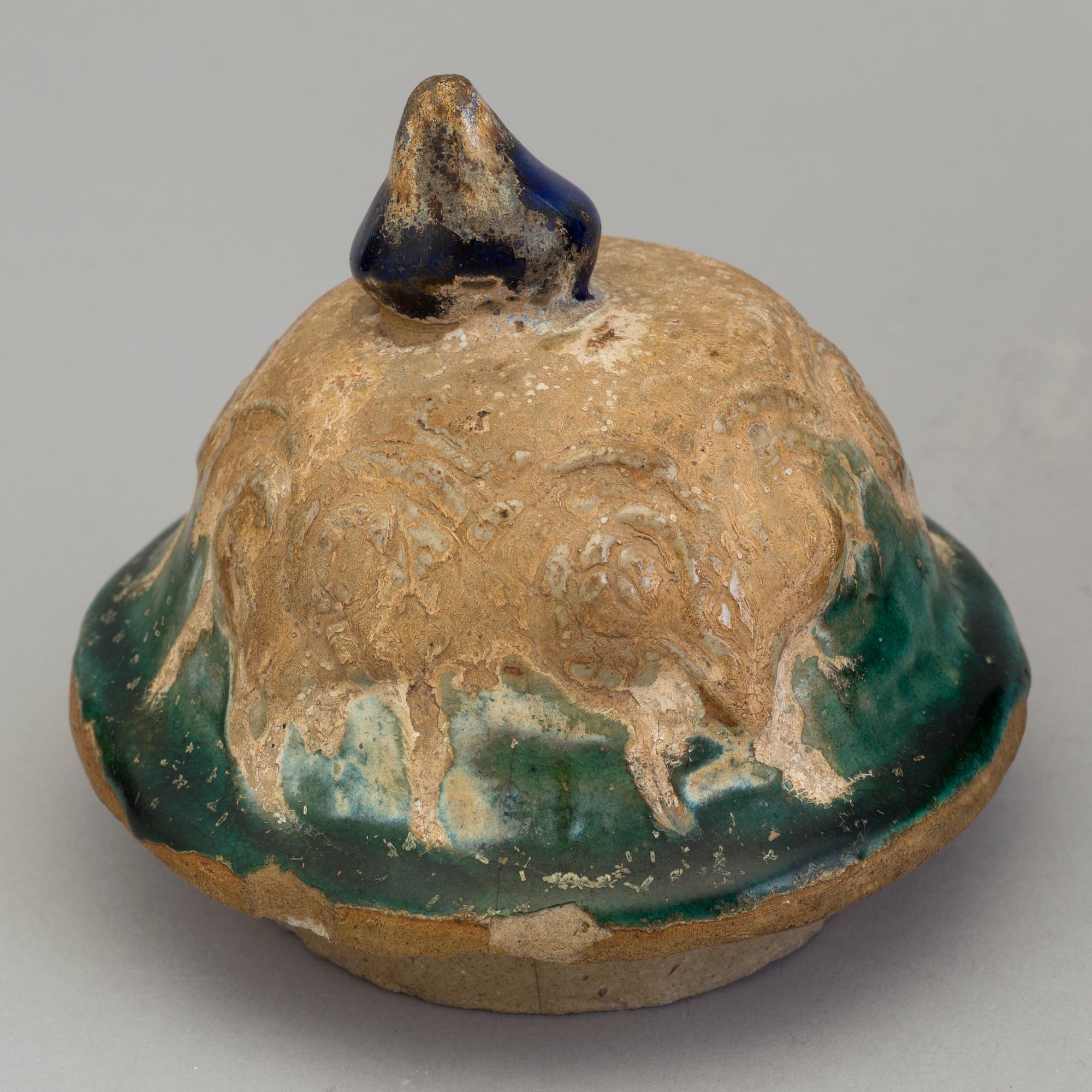 A Chinese 'Shiwan' ware pottery jar with cover, Qing dynasty, 19th ...