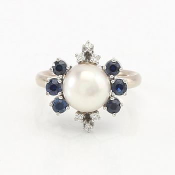 Ring in 14K white gold with a cultured pearl, round single-cut diamonds ...