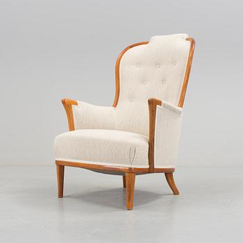 An armchair "Vår Fru" by Carl Malmsten, Bodafors. - Bukowskis